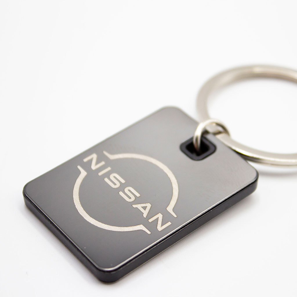Laser engraved metal keychain with PVC core | Vinyform